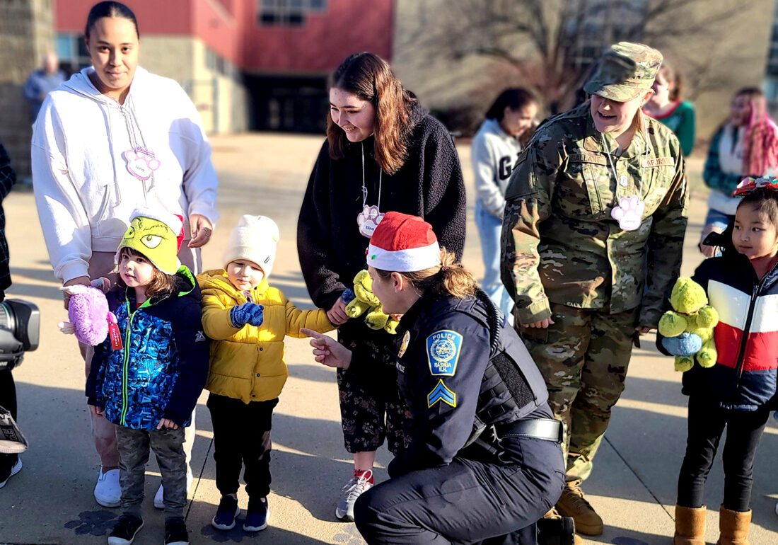 Santa, in the custody of Nashua SWAT officers, brings Christmas joy to ...